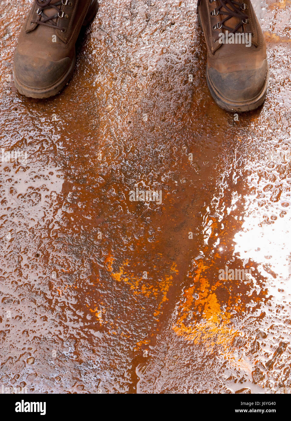 person reflection dirt outside wet mud vertical rust one reflections ...