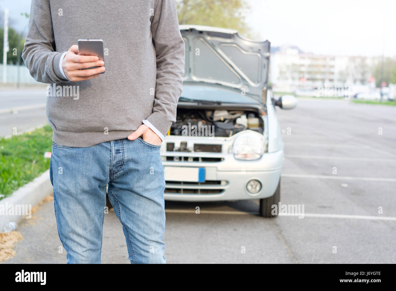 Man calling mechanic help service after car engine breakdown Stock ...