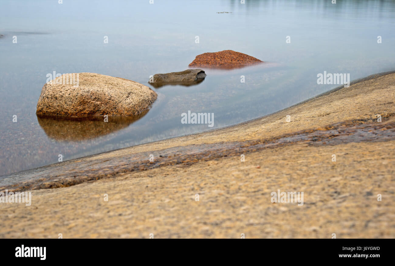 stones in water Stock Photo - Alamy