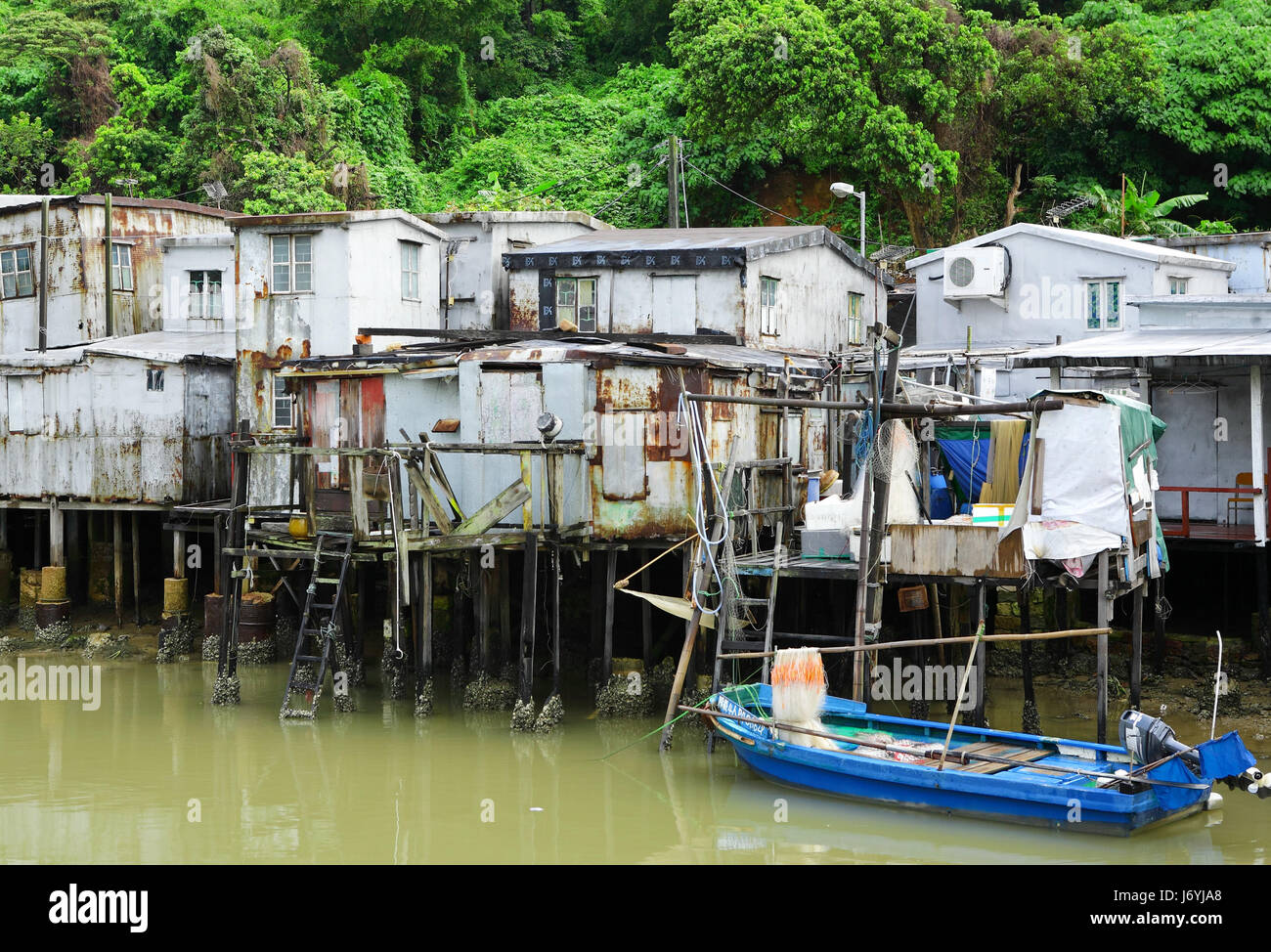 house building fishing stilt community village market town blue house ...