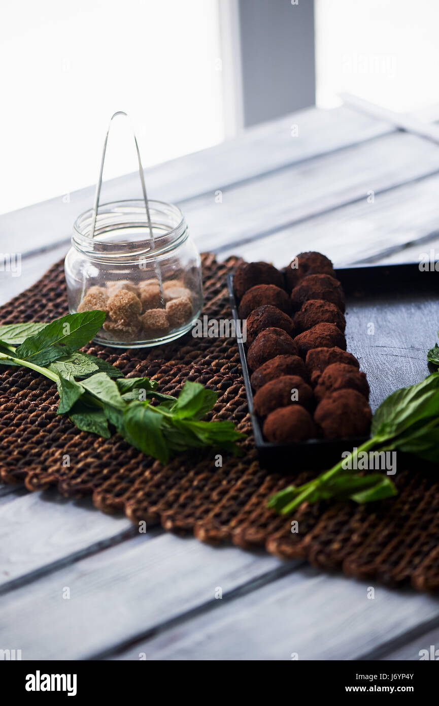 A lot of delicious round chocolate truffles. A work of culinary art ...