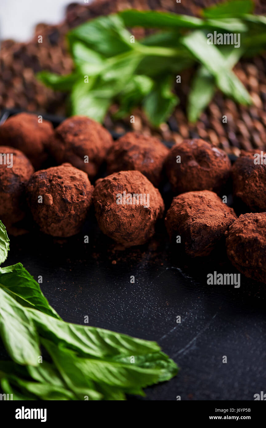 A lot of delicious round chocolate truffles. A work of culinary art ...