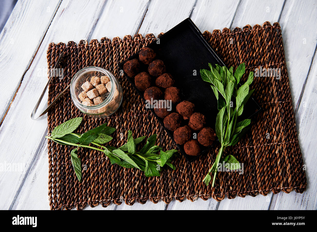 A lot of delicious round chocolate truffles. A work of culinary art ...