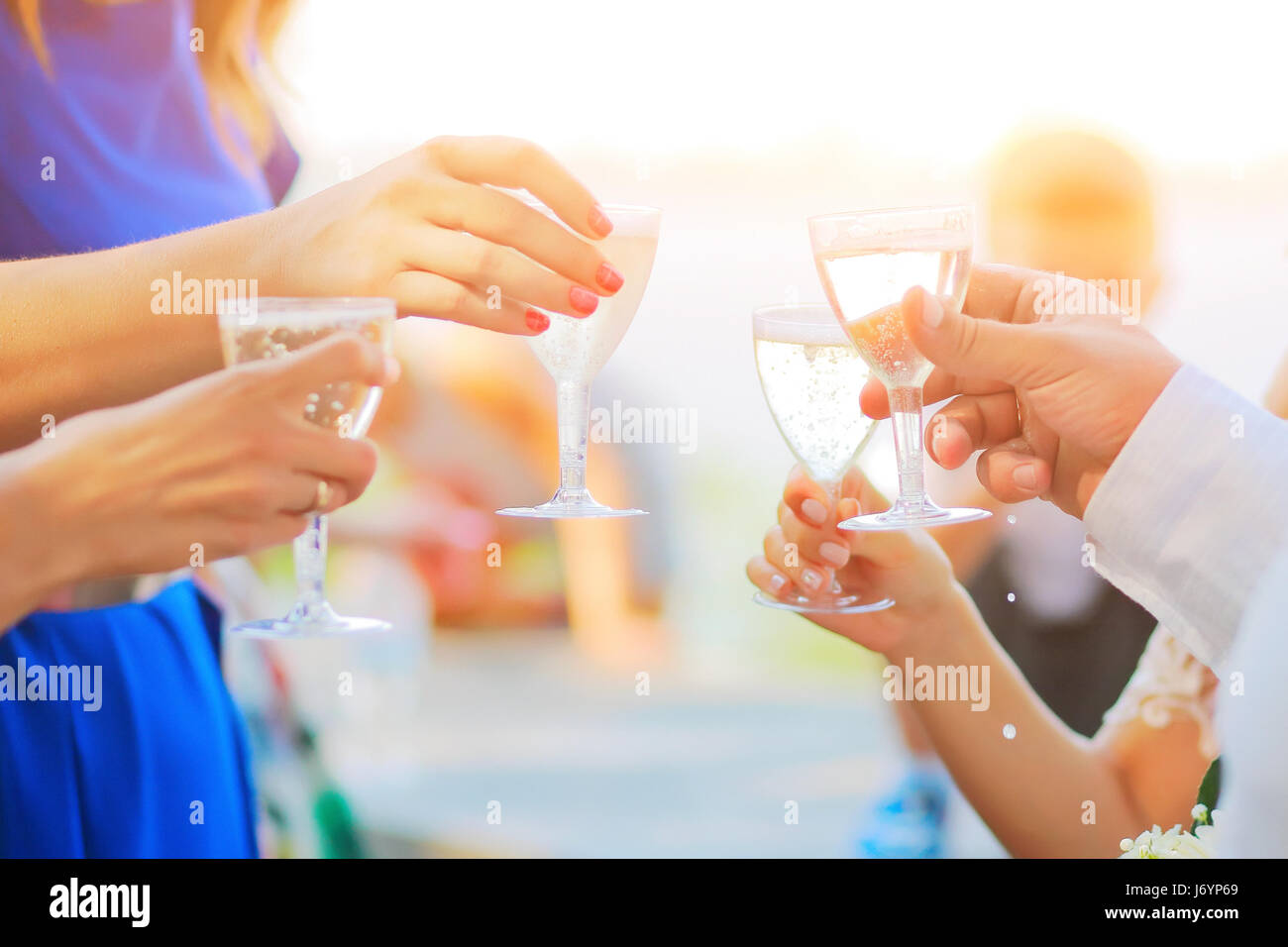 Glass champagne in hands hi-res stock photography and images - Alamy