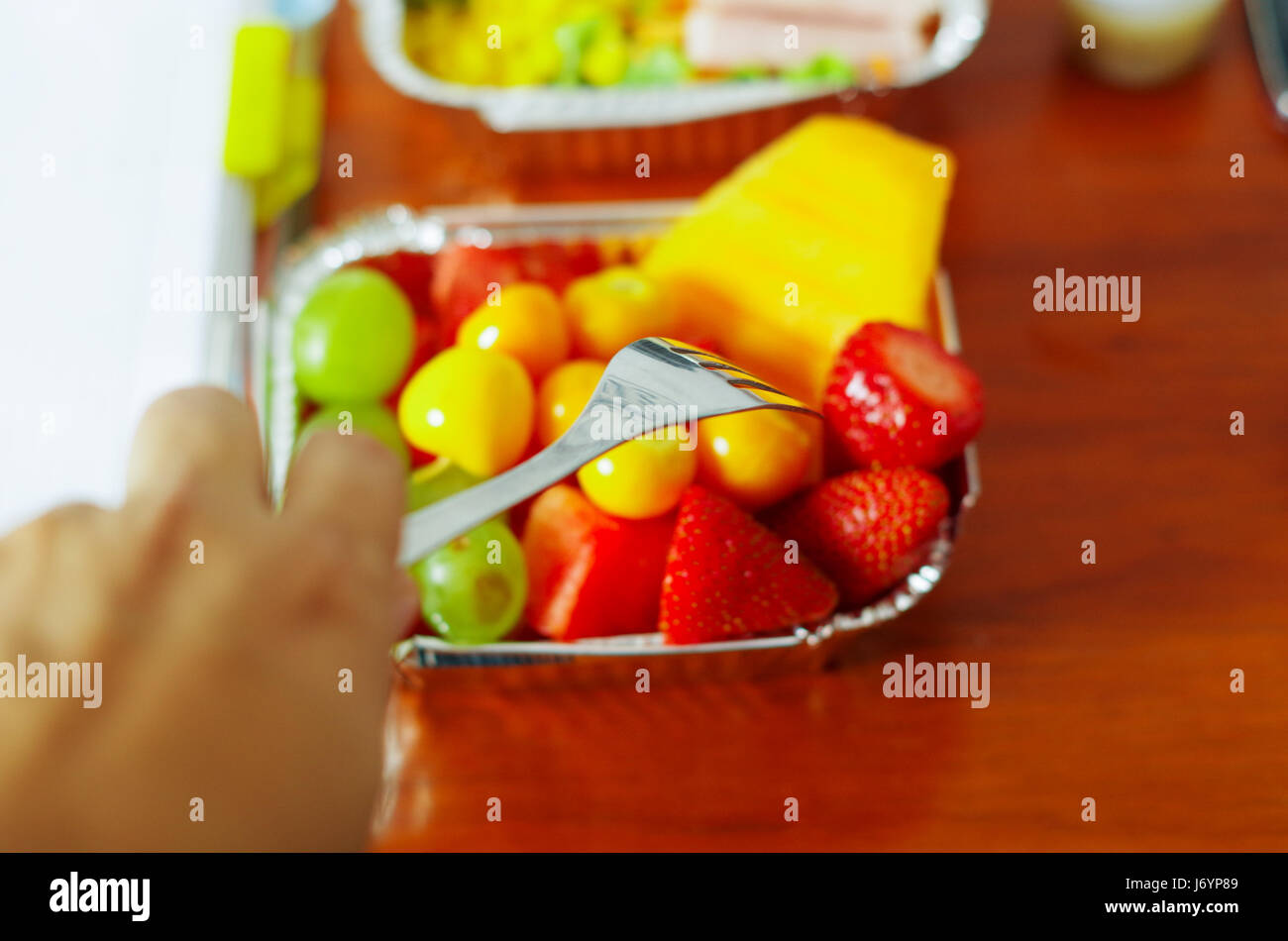 Using fork eat fresh fruit hi-res stock photography and images - Alamy