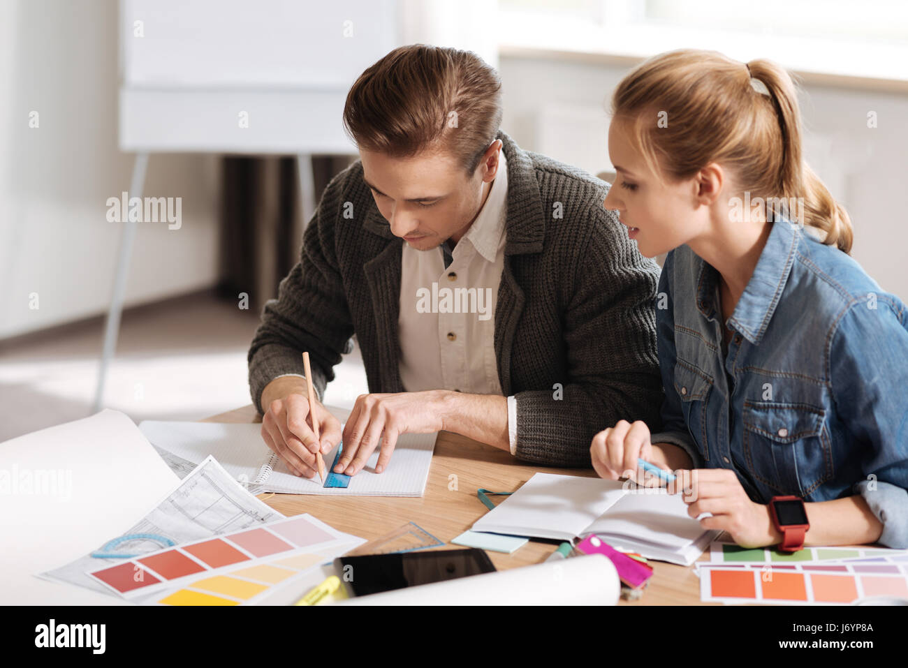 Professional handsome man drawing Stock Photo - Alamy