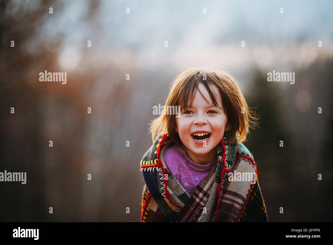 Child wrapped in quilt hi-res stock photography and images - Alamy