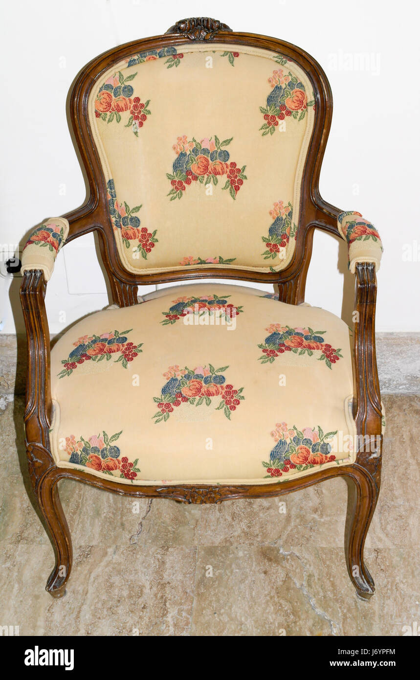 Antique Chair made of wood and cloth Stock Photo - Alamy