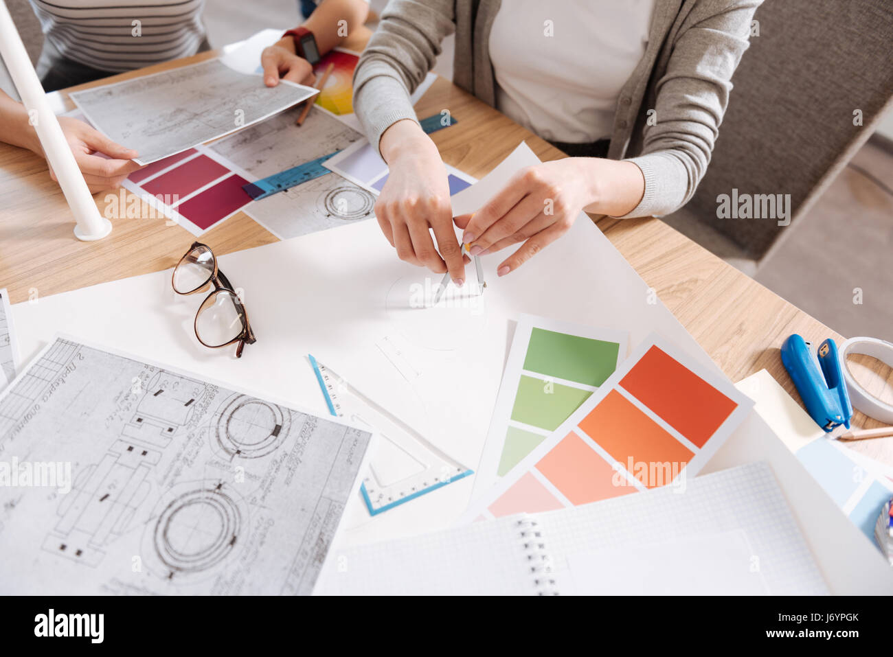 Top view of engineers drawings lying on the table Stock Photo - Alamy