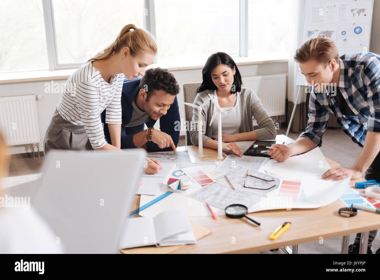 Nice serious engineers being involved in work Stock Photo - Alamy
