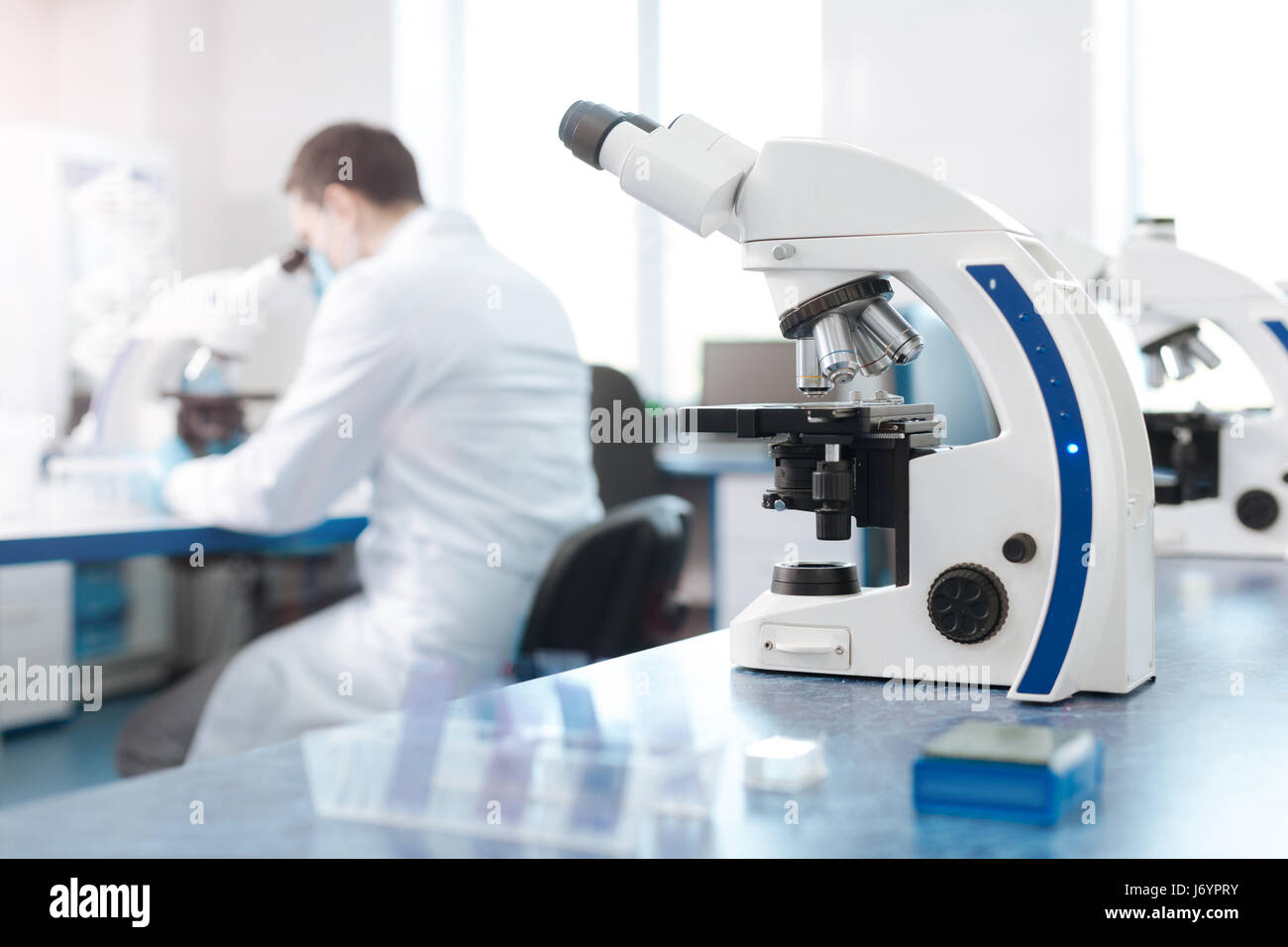 Scientist modern microscope table hi-res stock photography and images ...