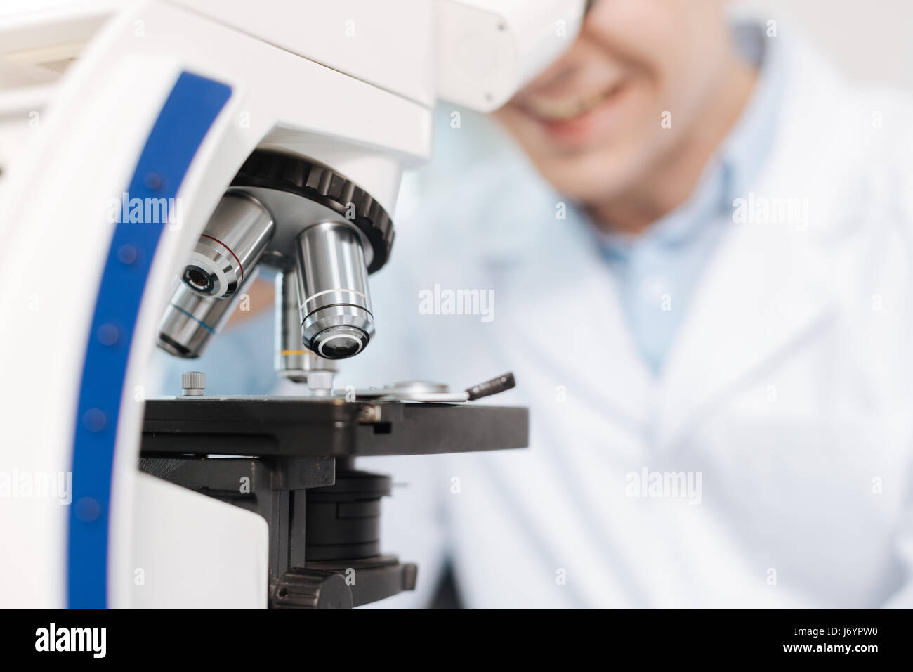 Close up of four objective lenses while being at work Stock Photo - Alamy