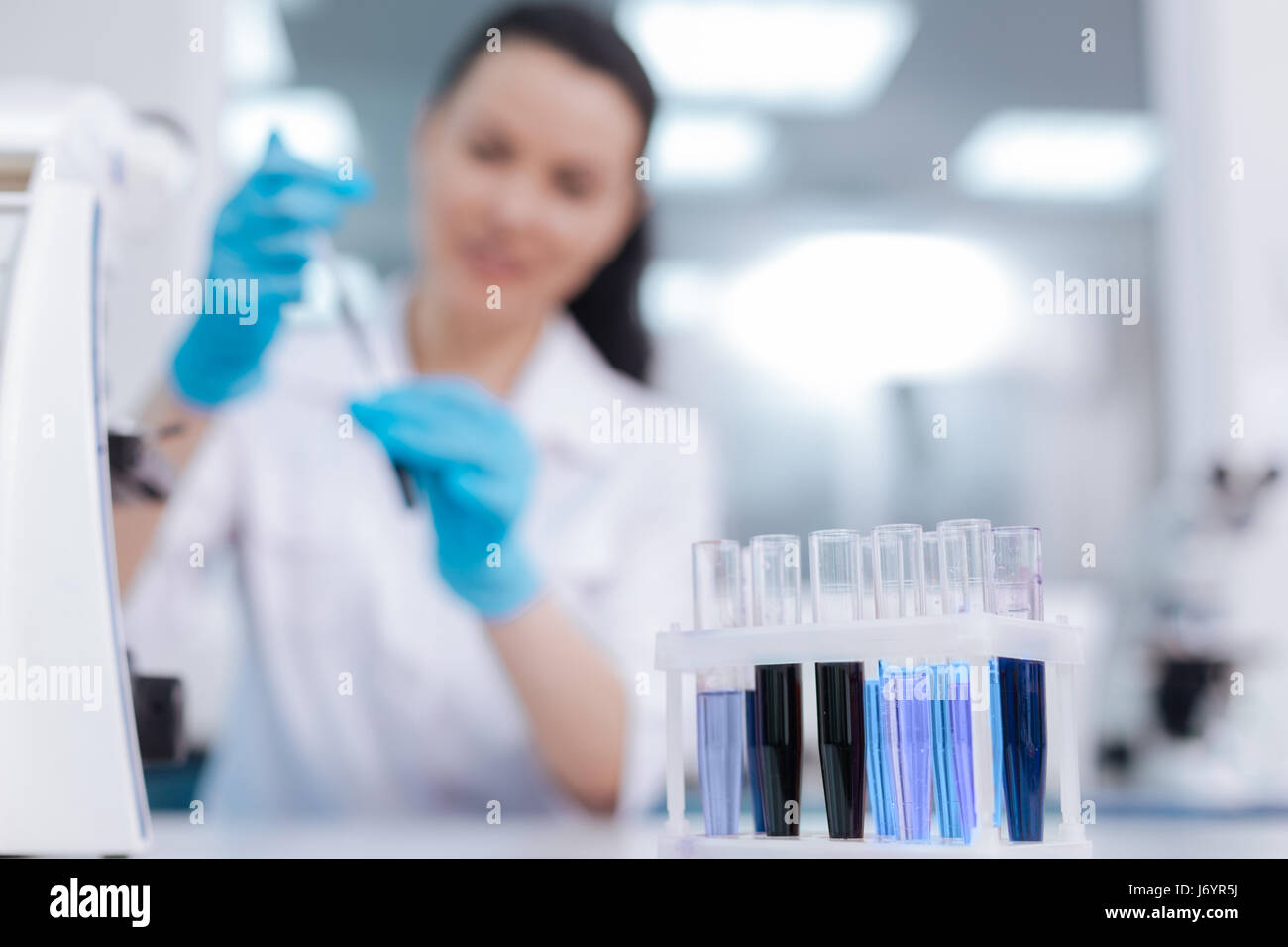 Close up of support with colorful test-tubes Stock Photo - Alamy