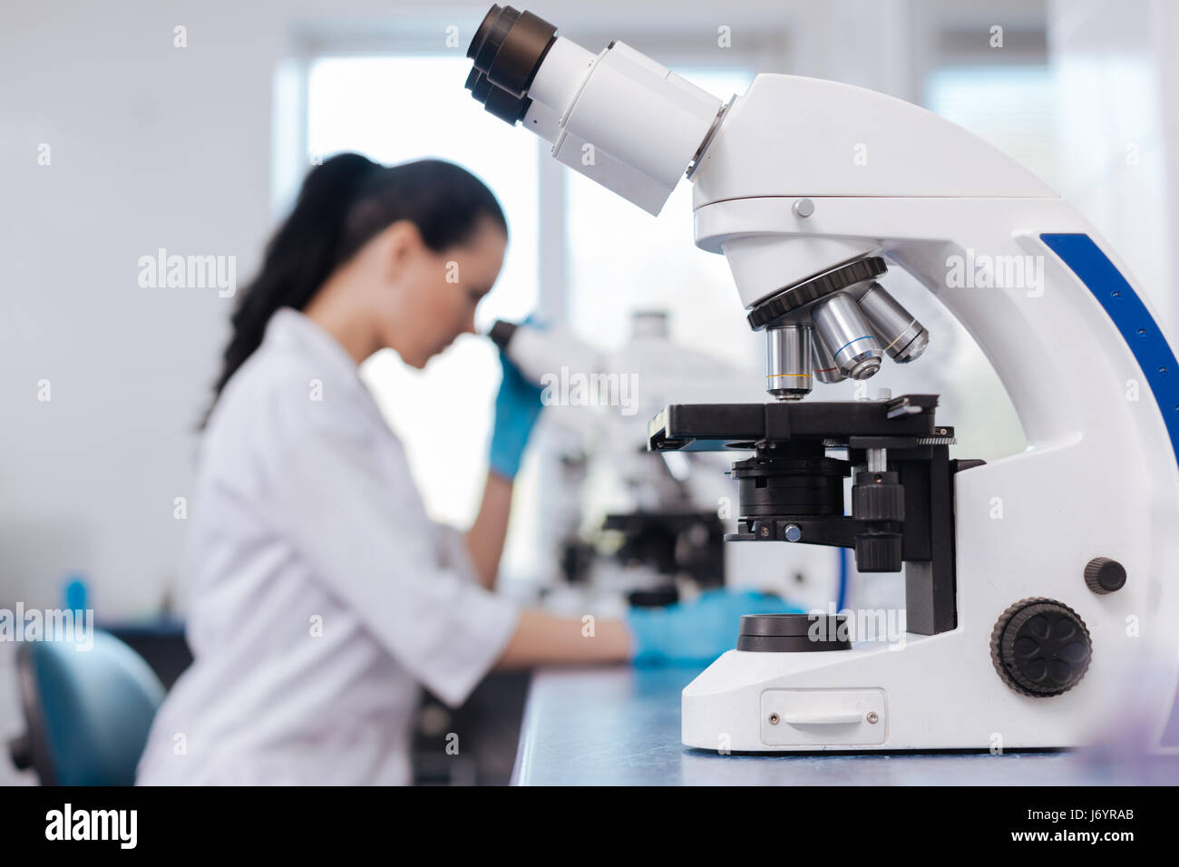 Scientist modern microscope table hi-res stock photography and images ...