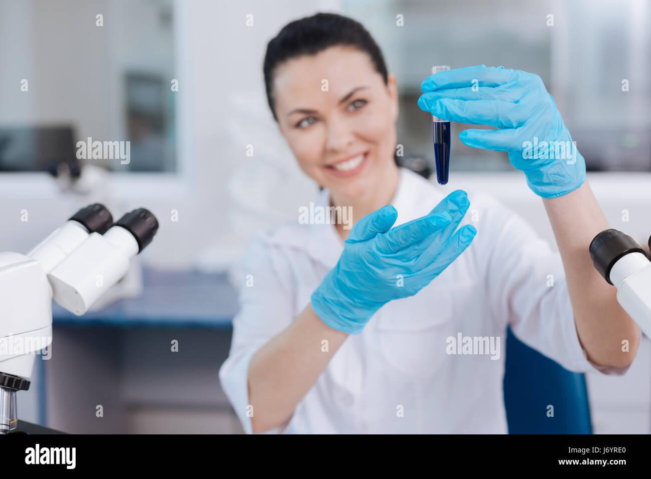 Female healthcare worker demonstrating hi-res stock photography and ...