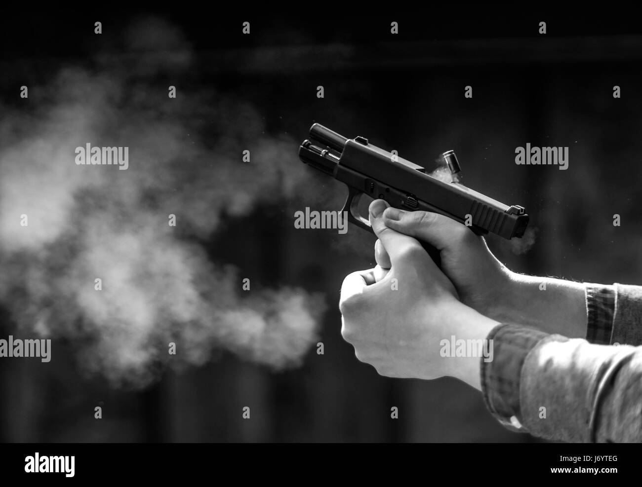 Pistol recoil hi-res stock photography and images - Alamy