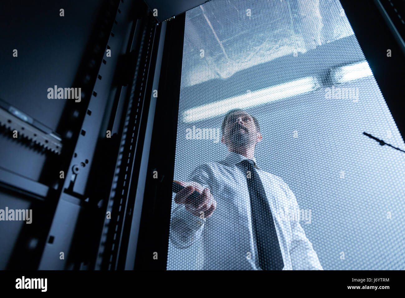 Man behind computer security hi-res stock photography and images - Alamy