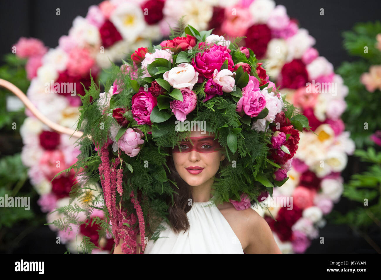 A model wears a bespoke Peony Floral headdress on the Primrose Hall ...