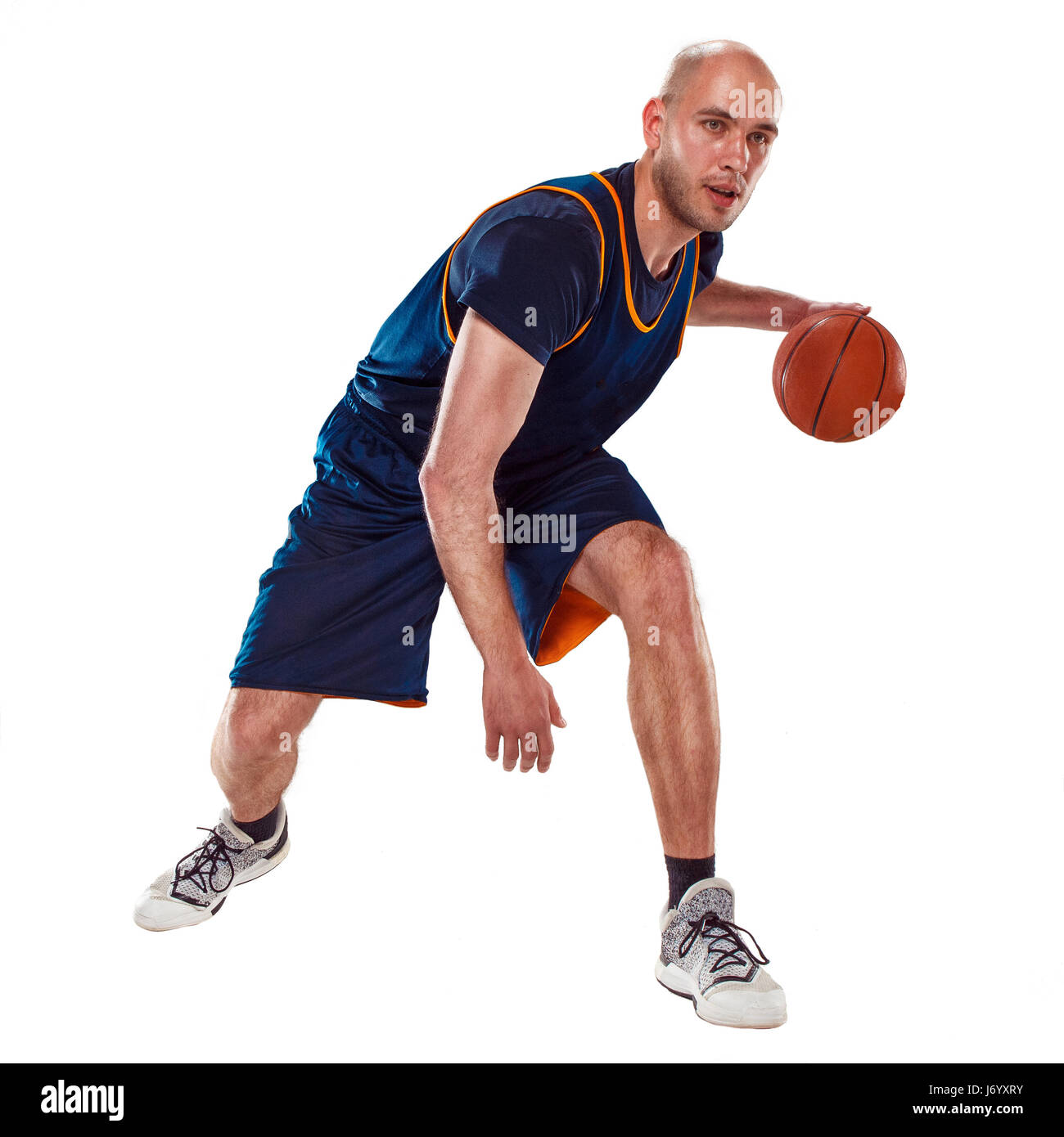 Full length portrait of a basketball player with ball Stock Photo - Alamy