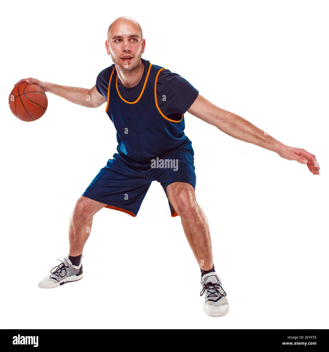 Full length portrait of a basketball player with ball Stock Photo - Alamy