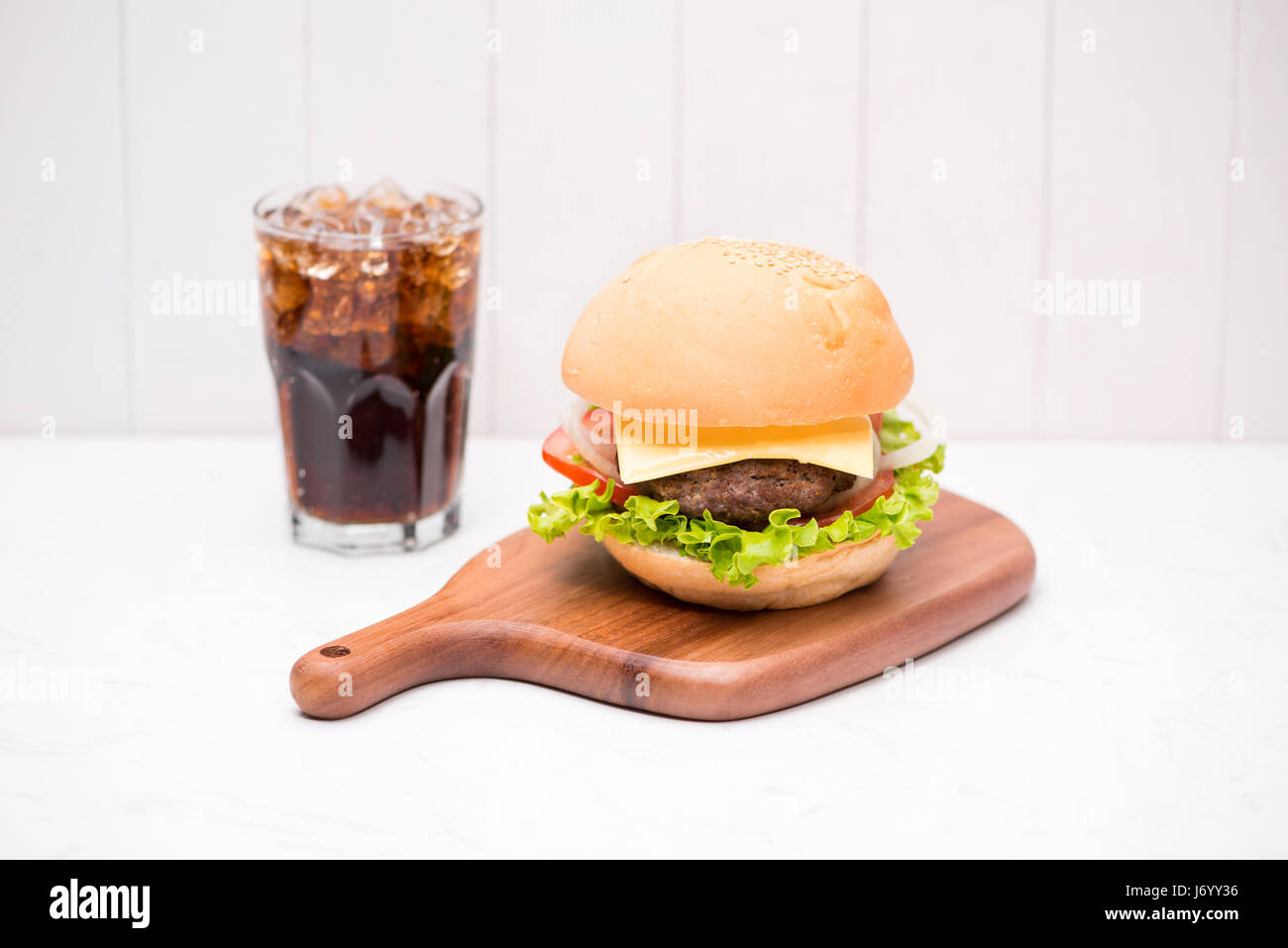 Homemade BBQ burger with coke on wooden background Stock Photo - Alamy