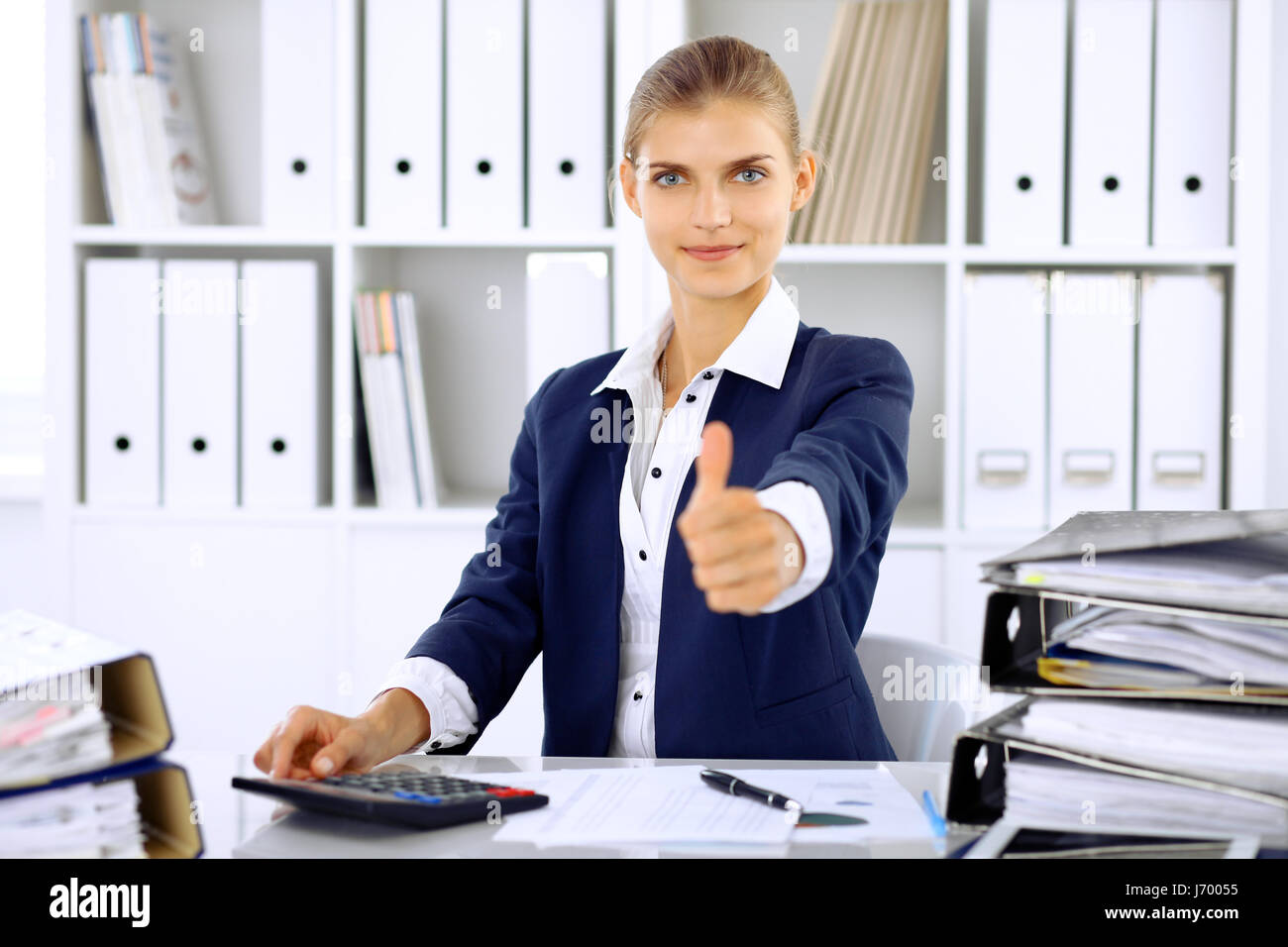 Modern business woman or confident female accountant, thumb up Stock ...