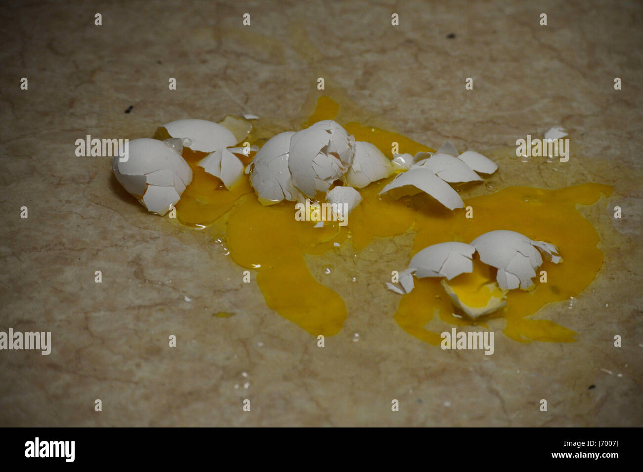 Broken Eggs on Floor Stock Photo: 141985750 - Alamy