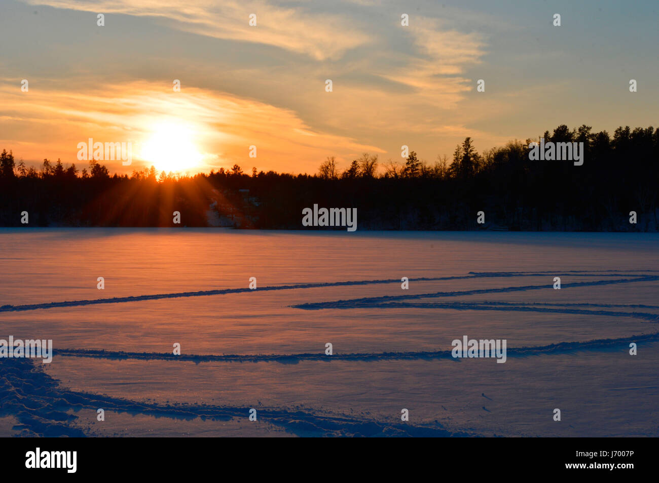 Frozen Lake at Sunset Stock Photo - Alamy