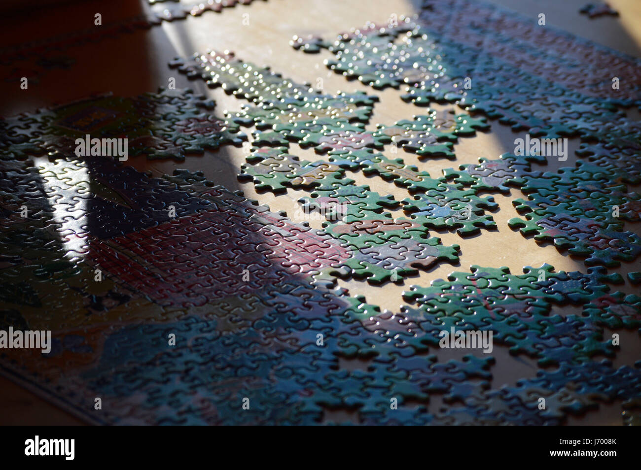 Puzzle in Shadows Stock Photo - Alamy