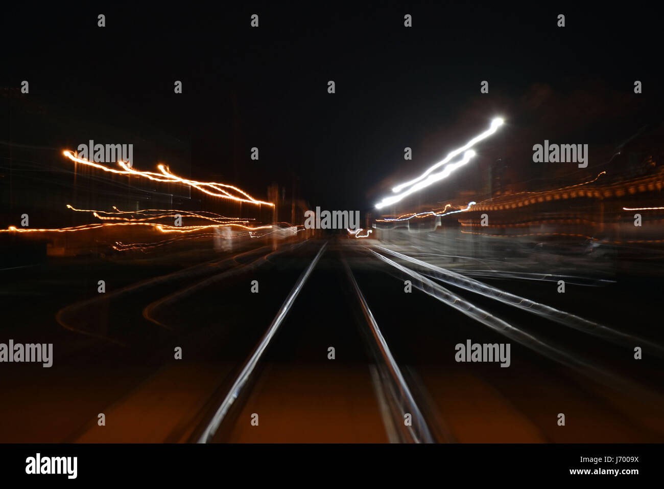 Train Tracks at Night Stock Photo - Alamy