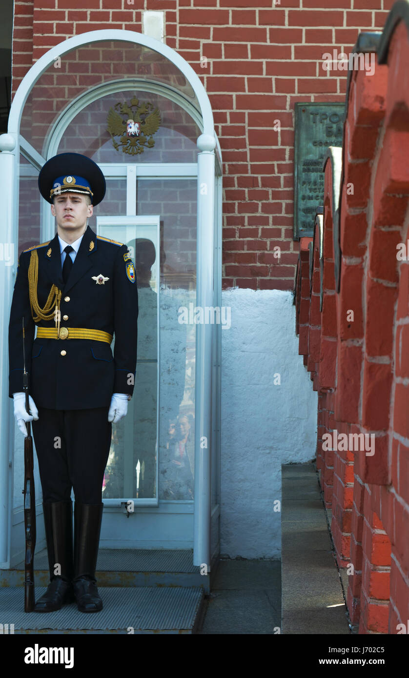 Moscow Kremlin: a Russian soldier on duty on the Troitsky Bridge, the ...