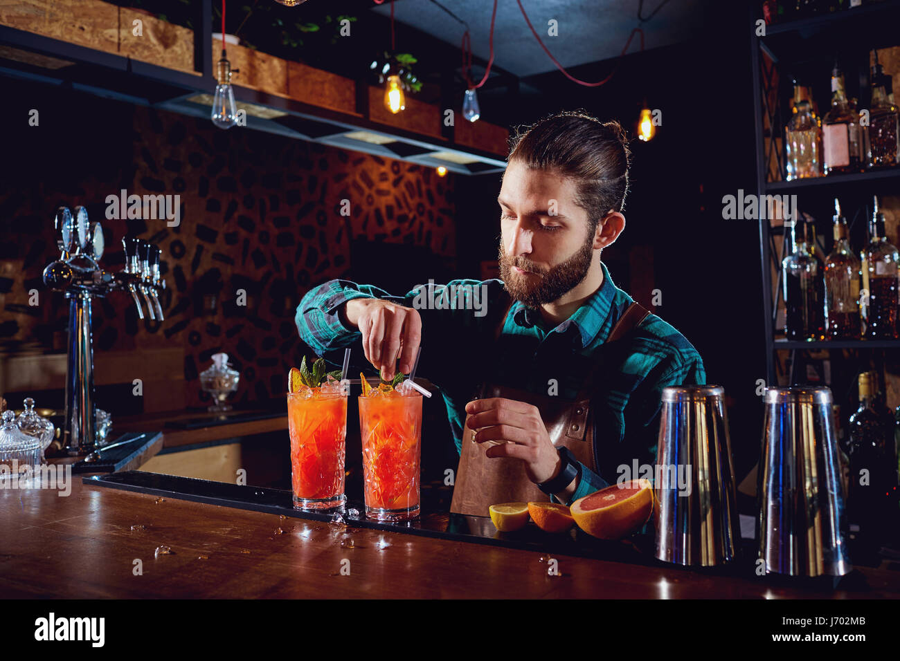 Bartender behind bar counter hi-res stock photography and images - Alamy