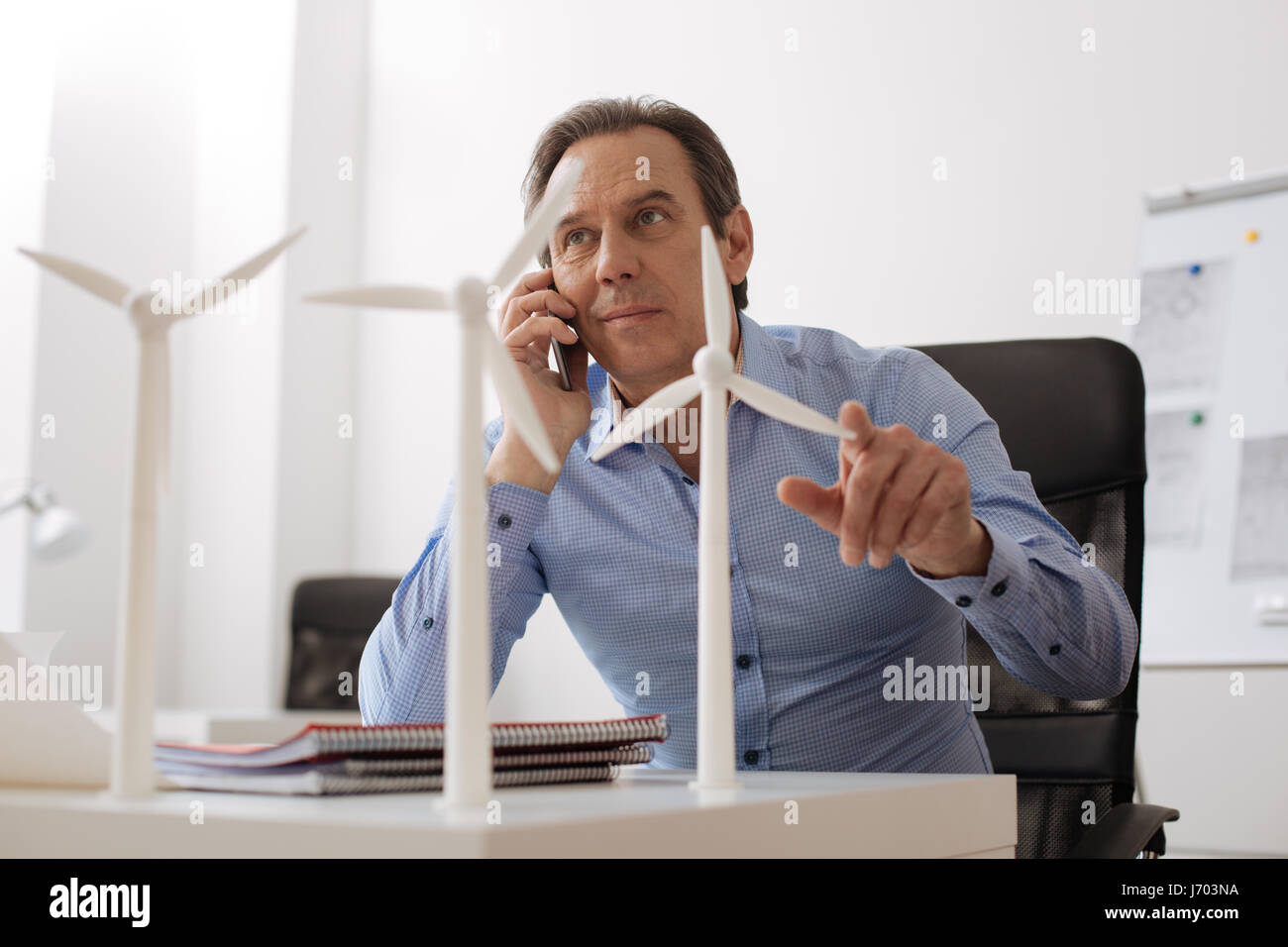 Professional engineer working on constructing eco turbines Stock Photo ...