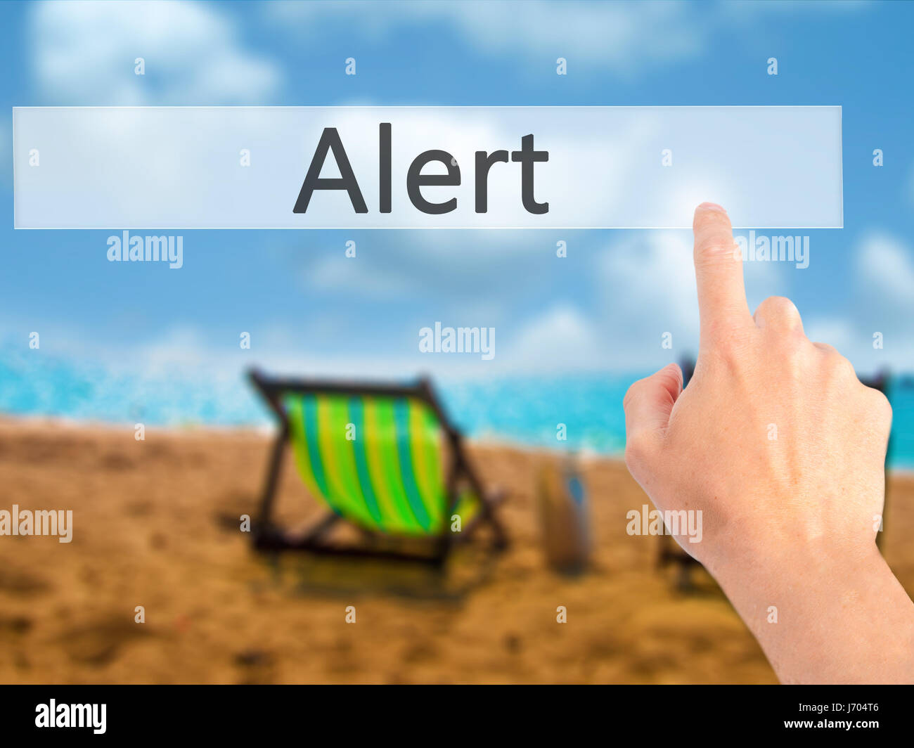 Alert - Hand pressing a button on blurred background concept . Business ...