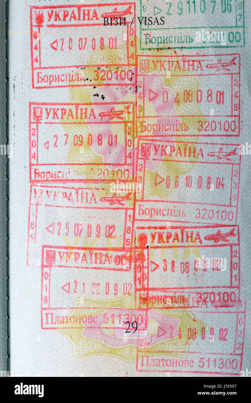 Passport page with Ukrainian entry and exit stamps closeup Stock Photo ...