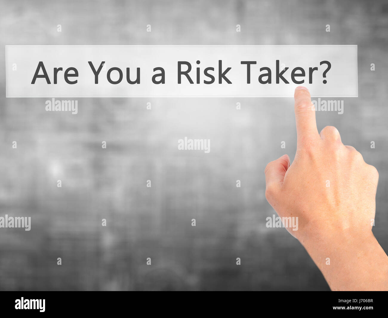 Are You a Risk Taker ? - Hand pressing a button on blurred background ...