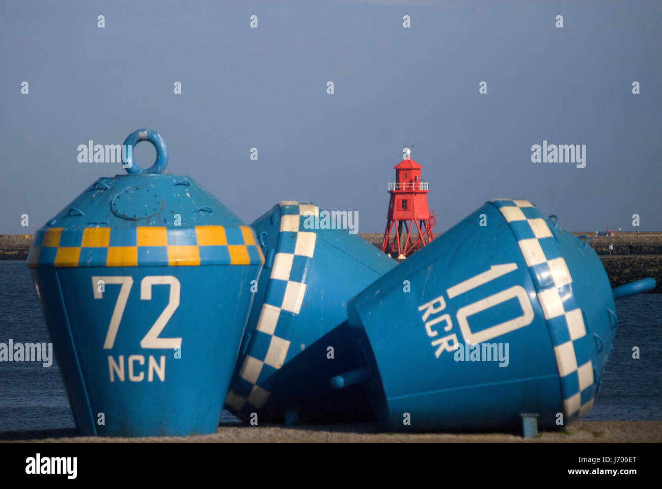 Buoys and lighthouse / North Shields Stock Photo - Alamy