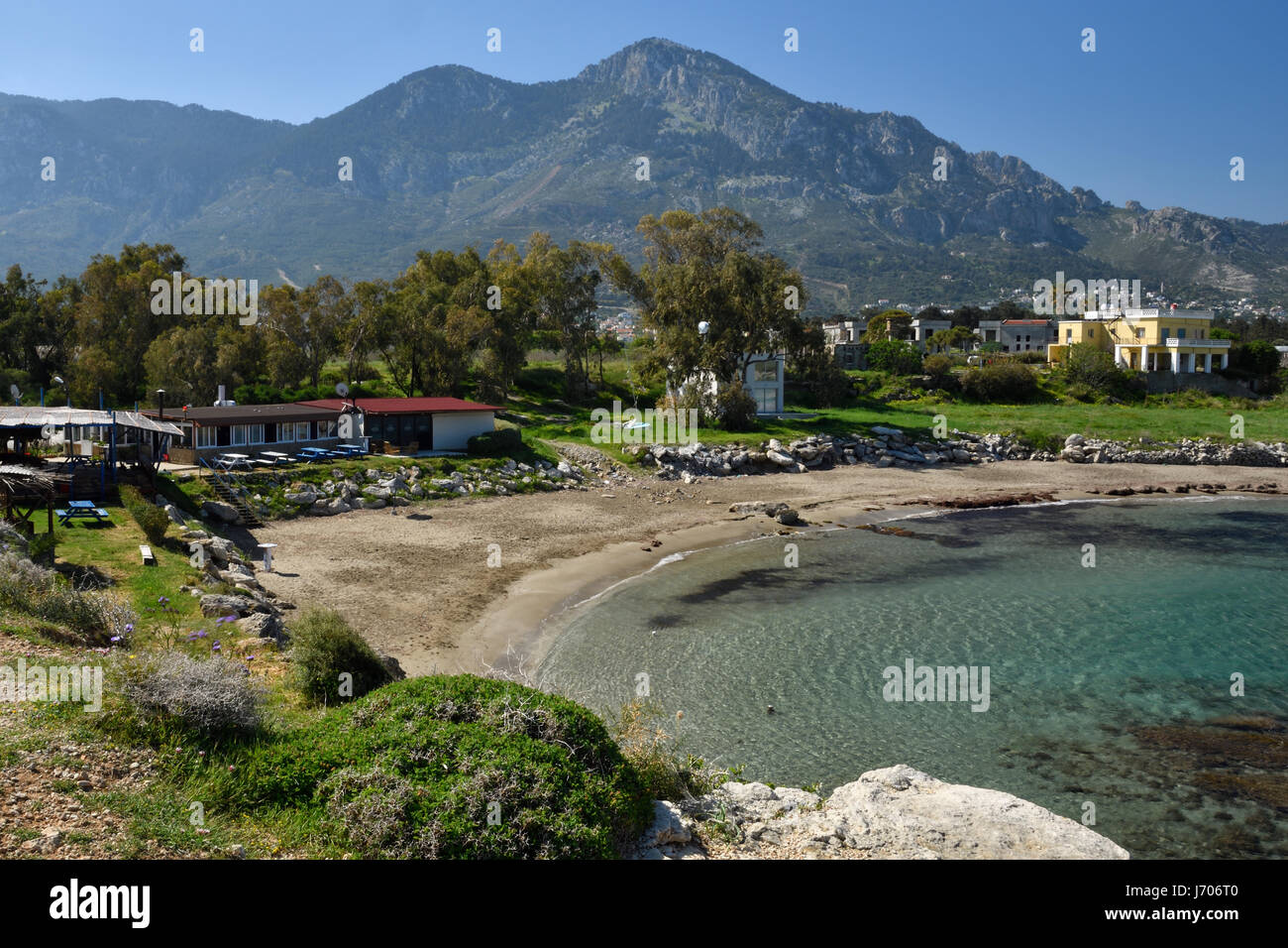 Bay with a beach near Lapta village with clear blue water and blue sky ...