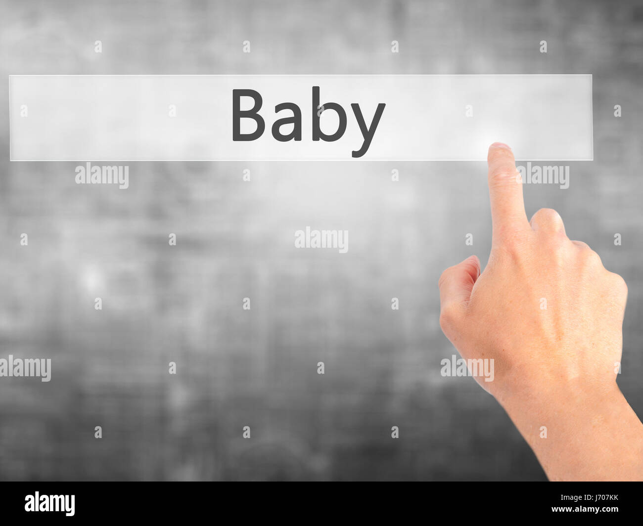 Baby - Hand pressing a button on blurred background concept . Business ...