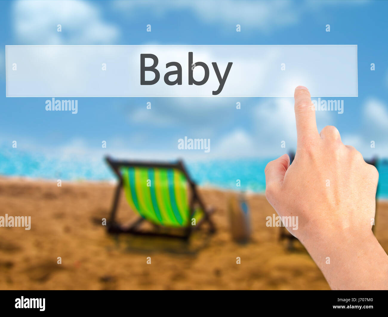 Baby - Hand pressing a button on blurred background concept . Business ...