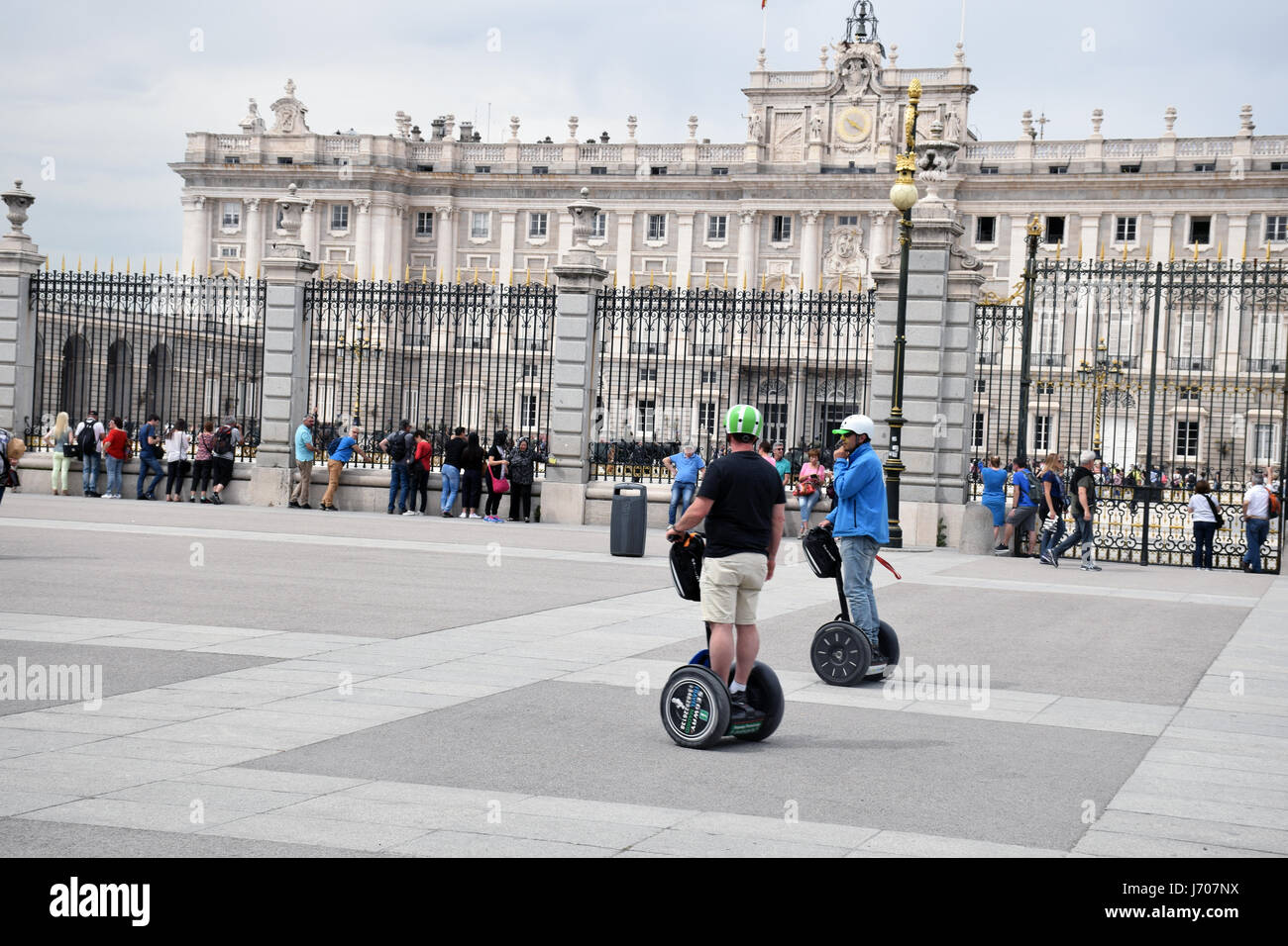 Segway tour in front of Palacio Real, Madrid, Spain Stock Photo - Alamy