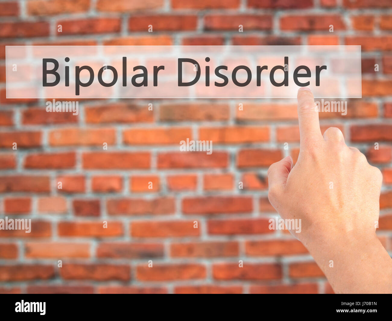 Bipolar Disorder - Hand pressing a button on blurred background concept ...