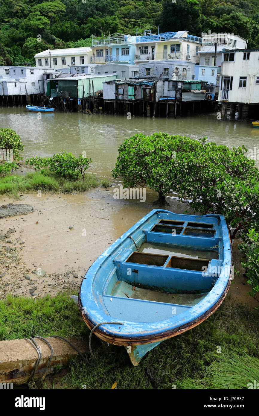 house building fishing stilt community village market town blue house ...