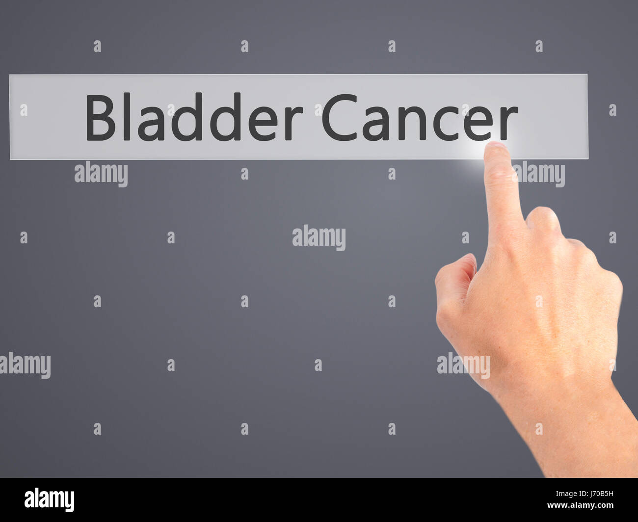 Bladder Cancer - Hand pressing a button on blurred background concept ...