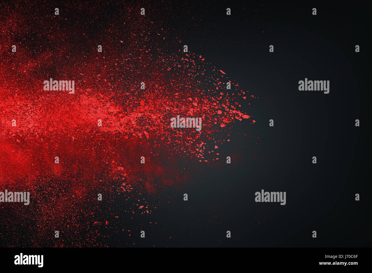 Powder paint explosion red background hi-res stock photography and ...