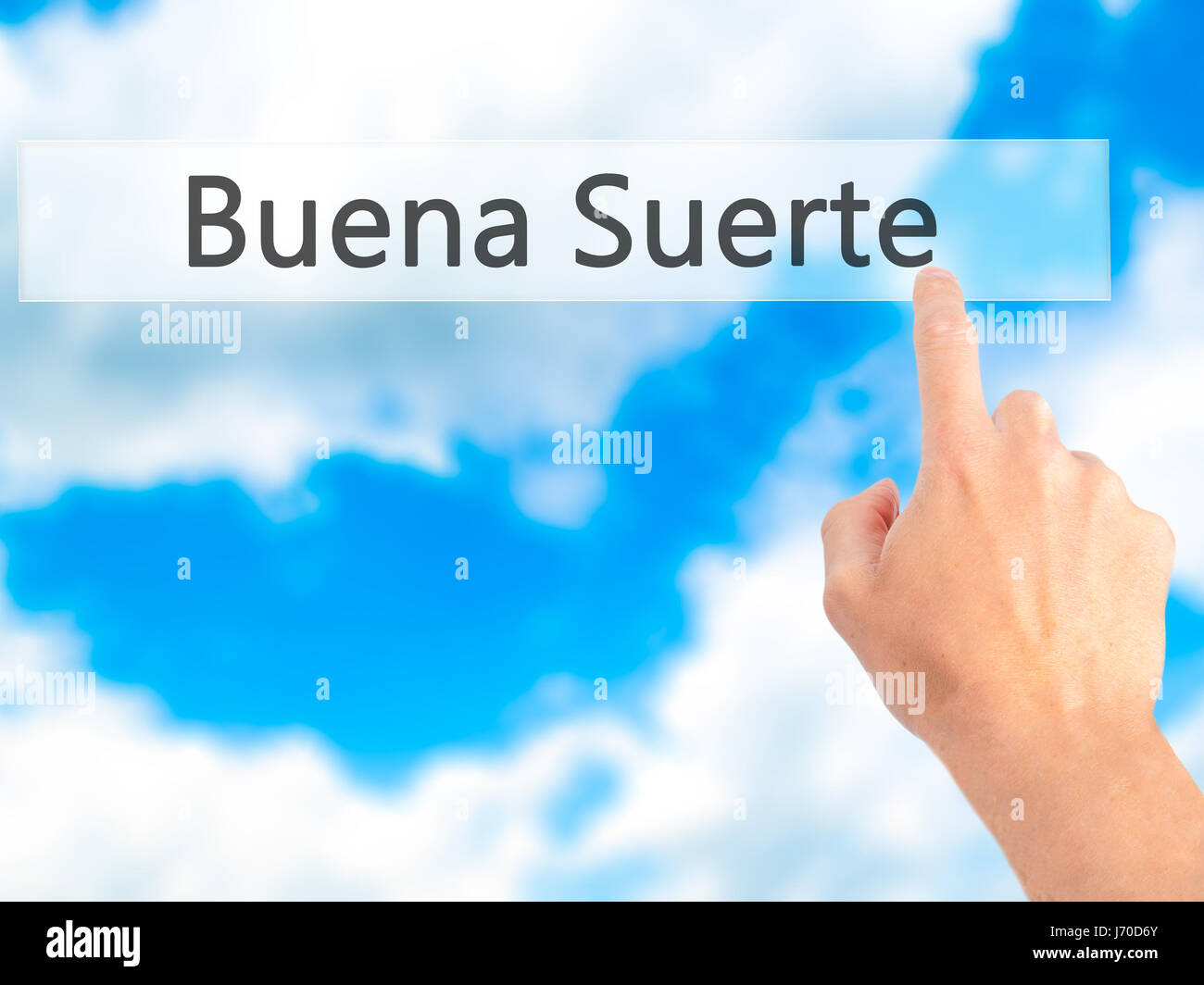 Buena Suerte ( Good Luck in Spanish) - Hand pressing a button on ...
