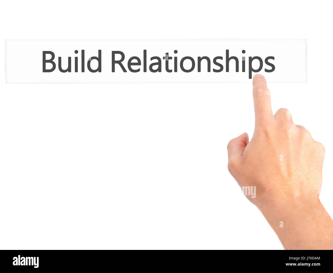 Build Relationships - Hand pressing a button on blurred background ...