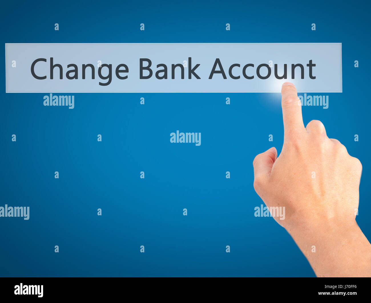 Change Bank Account - Hand pressing a button on blurred background ...