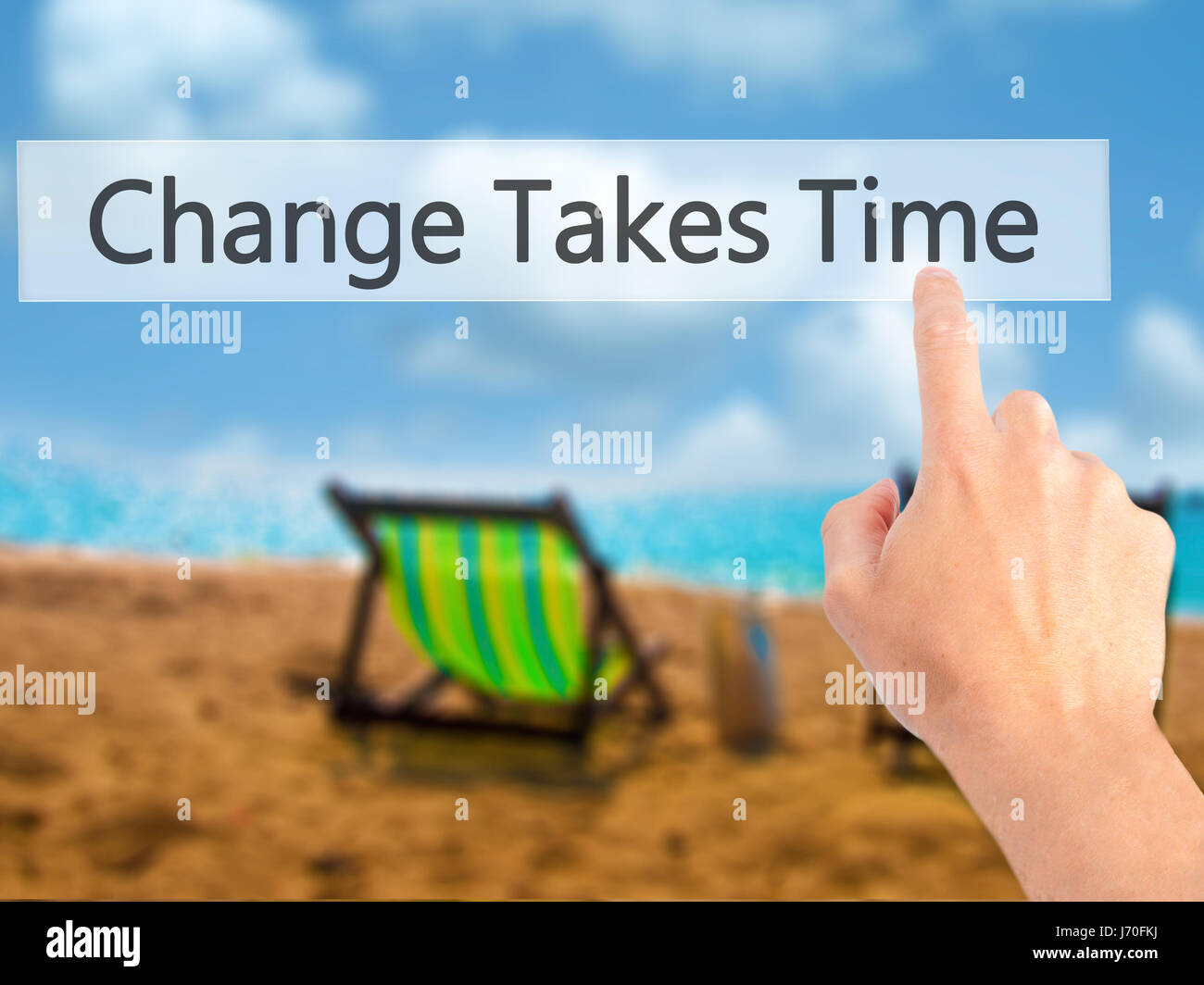 Change Takes Time - Hand pressing a button on blurred background ...