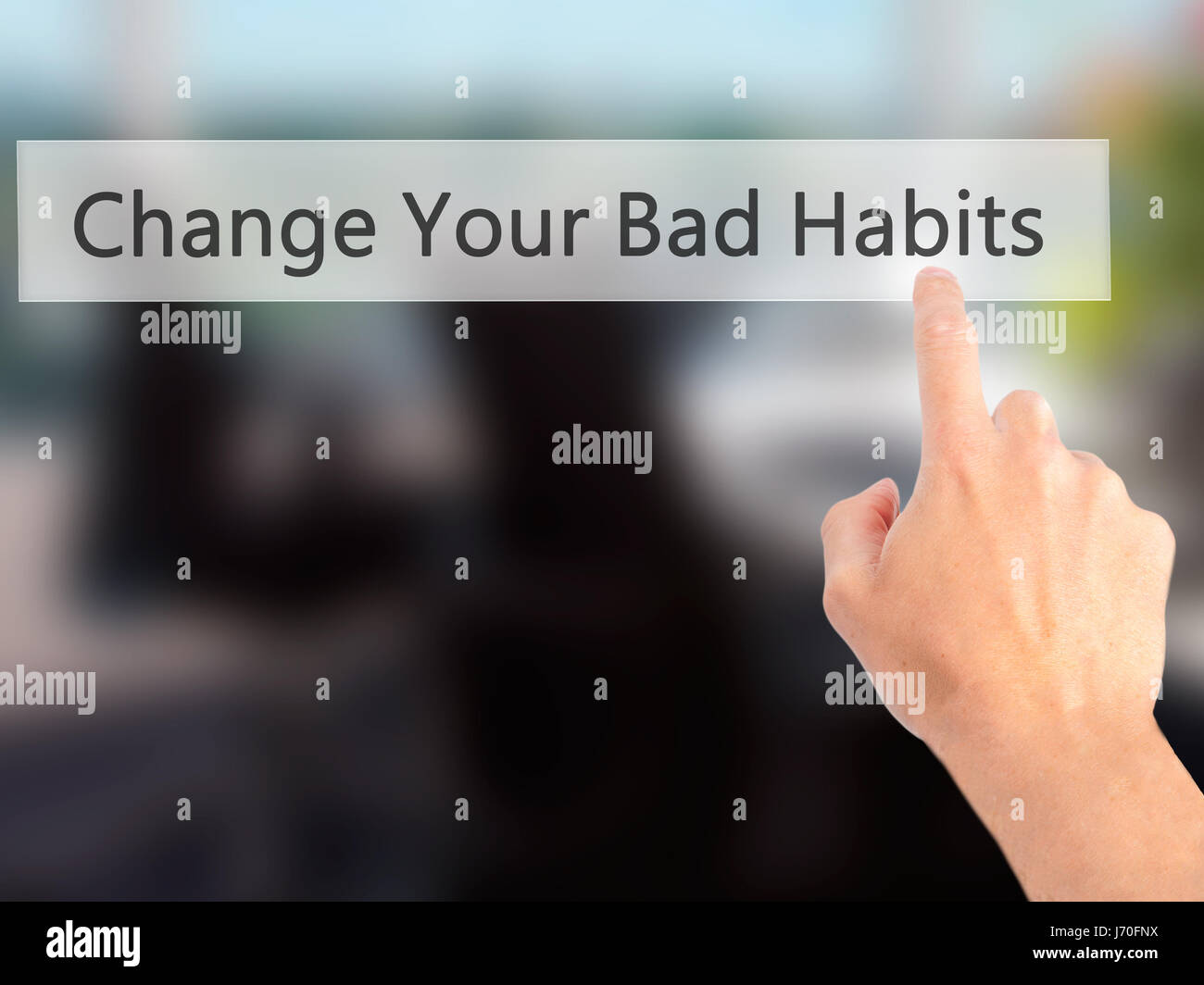 Change Your Bad Habits - Hand pressing a button on blurred background ...